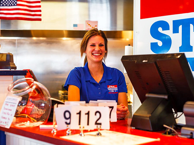 The smile says it all—when you serve food this good, customer satisfaction isn't just a goal, it's a daily occurrence.