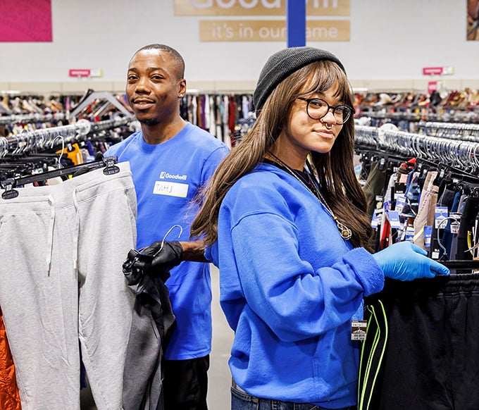 The blue-shirted staff aren't just employees—they're curators of possibility, helping treasures find their way to new homes.