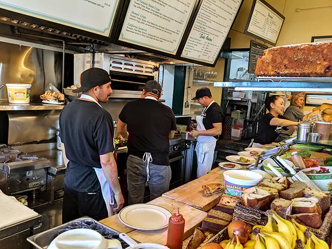 The breakfast brigade in their natural habitat. These culinary conductors orchestrate a symphony of sizzles and flips.