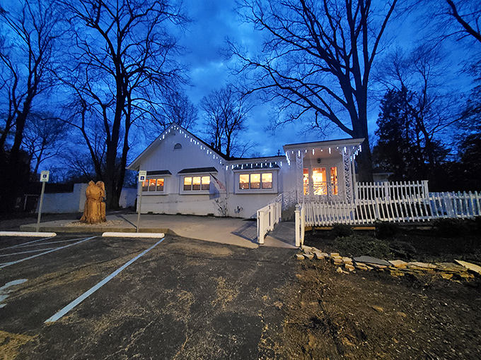 As twilight falls, Hollyhock Hill transforms into a beacon of warmth. Those twinkling lights aren't just decoration—they're a dinner invitation.