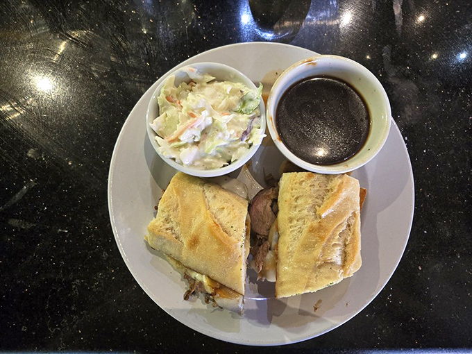 A proper French dip with coleslaw that doesn't play second fiddle. That dark au jus is calling your name.
