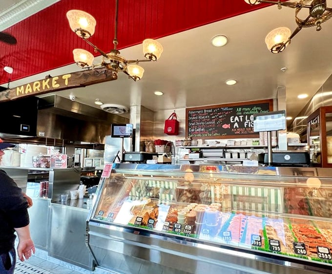 The seafood market display case: where tomorrow's dinner meets today's dreams. Fresh catches waiting for their moment of glory.