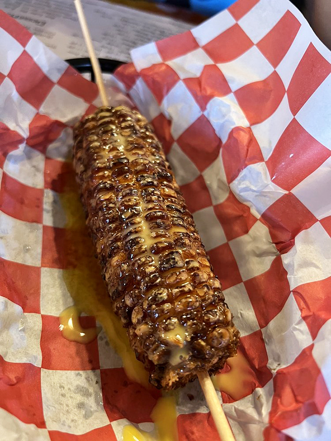 Grilled corn on a stick—nature's perfect food made even better with a little char, butter, and the magic of eating something on a stick.