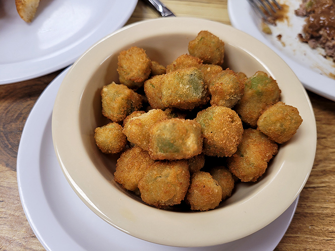 Golden nuggets of fried okra that crunch like nature's popcorn&mdash;the perfect Southern side dish that makes vegetables worth eating.