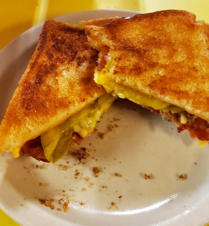 Grilled cheese elevated from childhood memory to grown-up indulgence. The bacon and pickles aren't just additions—they're flavor ambassadors from the land of "Why didn't I think of that?"