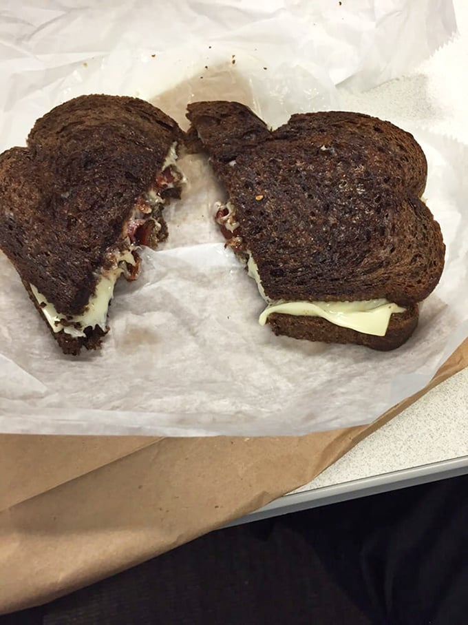 When comfort food gets its PhD&mdash;dark rye, melted cheese, and what appears to be pastrami mingling in grilled sandwich perfection.