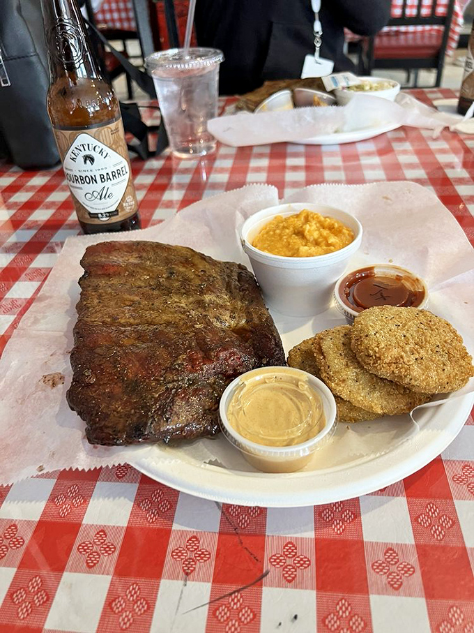 Ribs that have achieved that perfect balance between clinging to the bone and surrendering to your bite. The sides know their role.