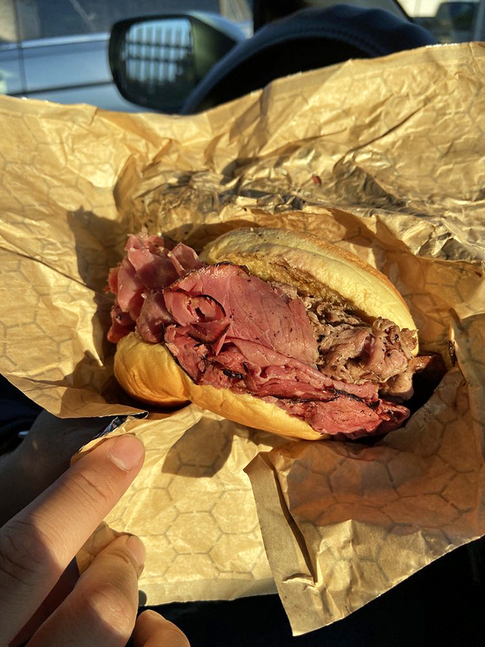 A study in contrasts&mdash;the rosy pink of ham alongside the deeper hues of beef. Meat harmony achieved on humble brown paper.