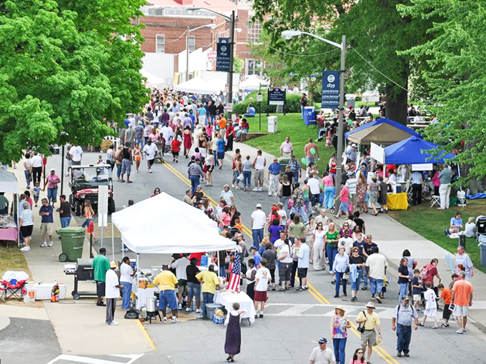 The Heart of Virginia Festival transforms Main Street into a vibrant community living room where strangers become neighbors over funnel cake and local music.