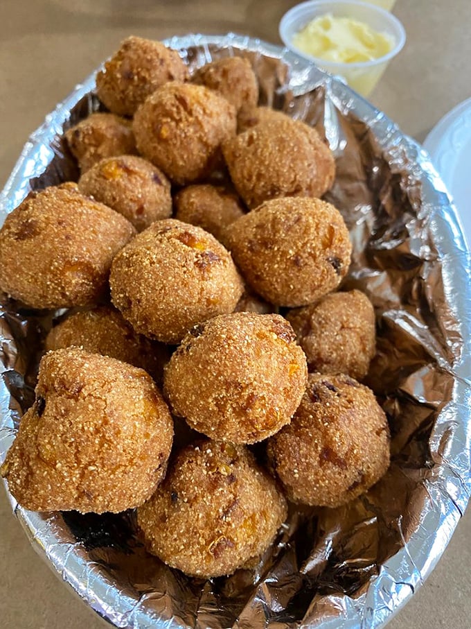 Hush puppies that deserve to speak loudly. These golden orbs of cornmeal goodness are the unsung heroes of any proper seafood feast.
