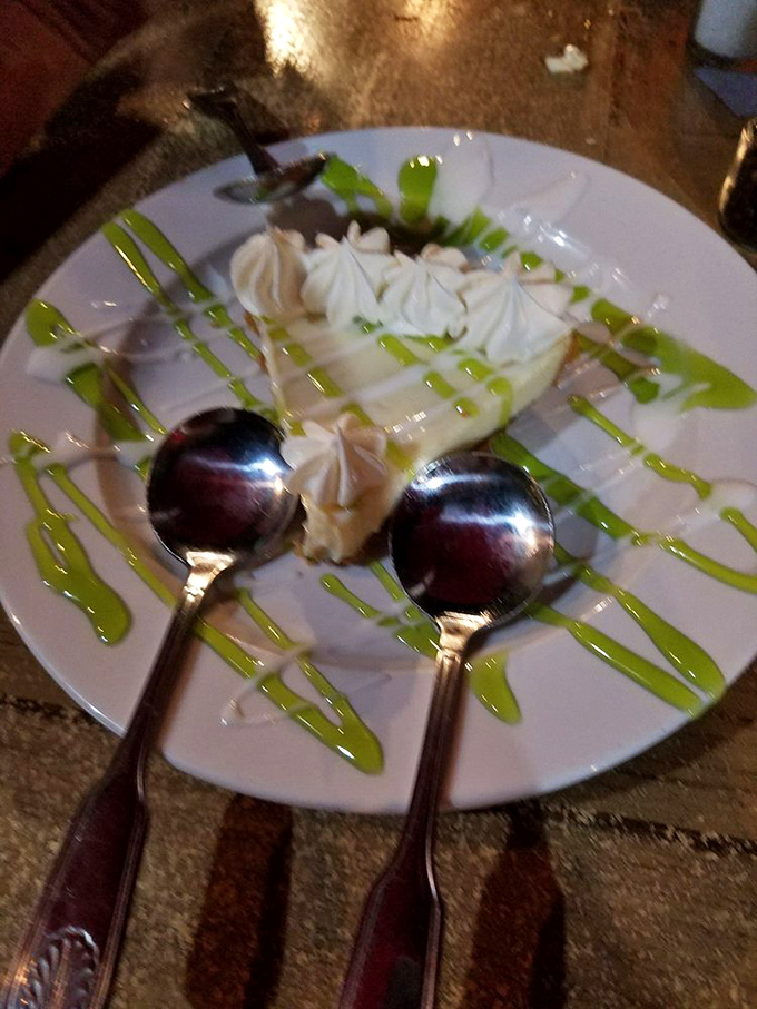 Key lime pie with artistic green drizzles – Florida's signature dessert dressed up for a night on the town.