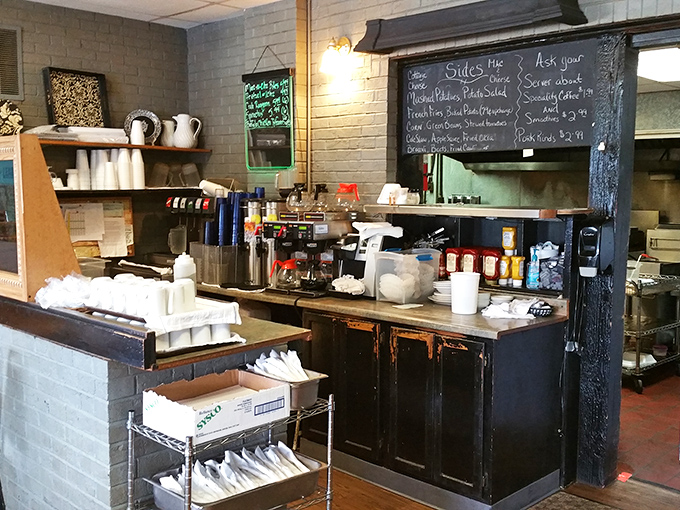 Where the magic happens &ndash; a working kitchen with handwritten specials on the chalkboard, the ultimate sign of a place that adapts to what's fresh.