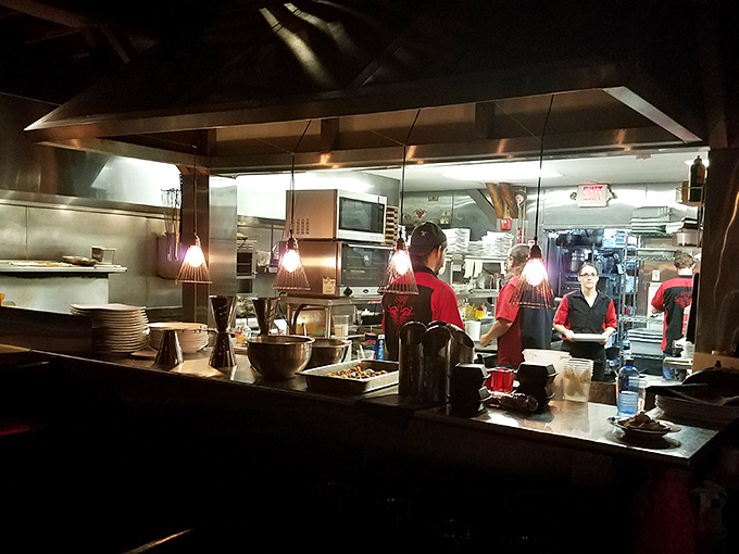 Where the magic happens. The open kitchen design lets you witness culinary artistry in action&mdash;dinner and a show in one.