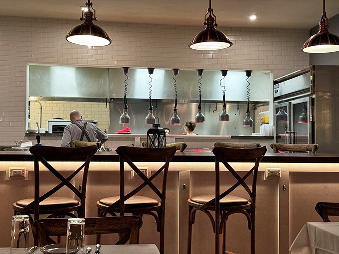 Kitchen theater at its finest&mdash;where heat lamps stand guard over culinary magic and diners get front-row seats to the delicious drama.