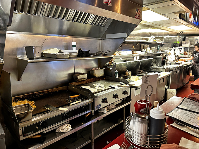 Behind-the-scenes magic where morning miracles happen on well-seasoned grills that hold decades of breakfast memories.