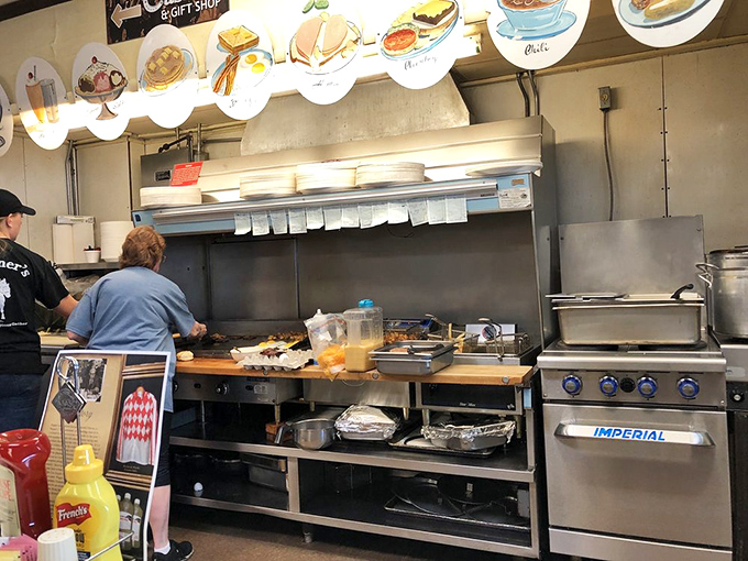 Where the magic happens! This no-nonsense kitchen has been turning out breakfast masterpieces since before most tracks had photo finishes.