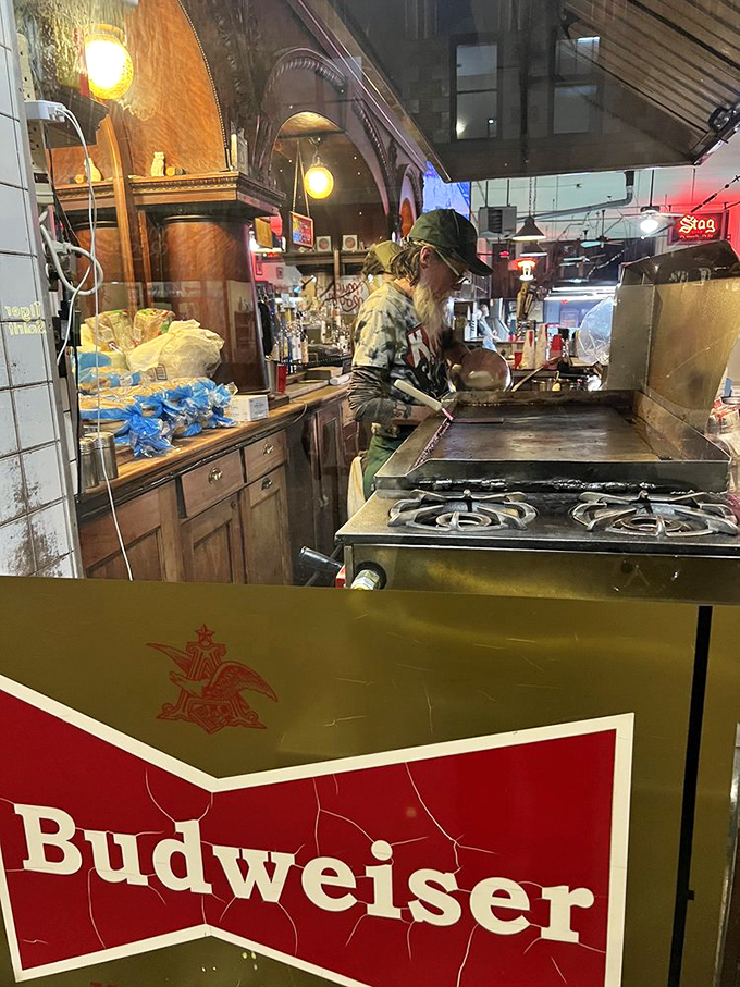 Behind the scenes, simple ingredients transform into legendary burgers on a well-seasoned grill that holds more flavor than any fancy kitchen gadget.