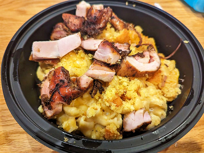 Mac and cheese achieving its highest purpose&mdash;as a foundation for smoky, tender pork. Comfort food gets an advanced degree in flavor.