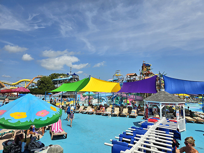 Lounge chairs line the deck like a regiment of soldiers ready for the battle against summer heat and parental exhaustion.