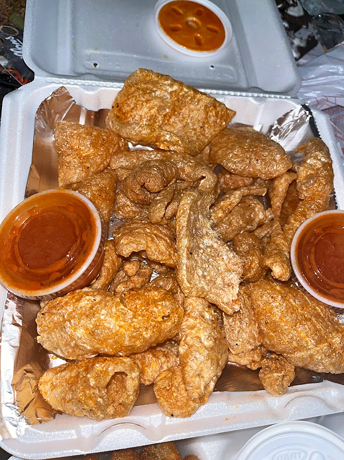 These aren't just wings - they're crispy, sauce-lacquered flavor vehicles that prove Fish & More's talents extend well beyond the seafood section.