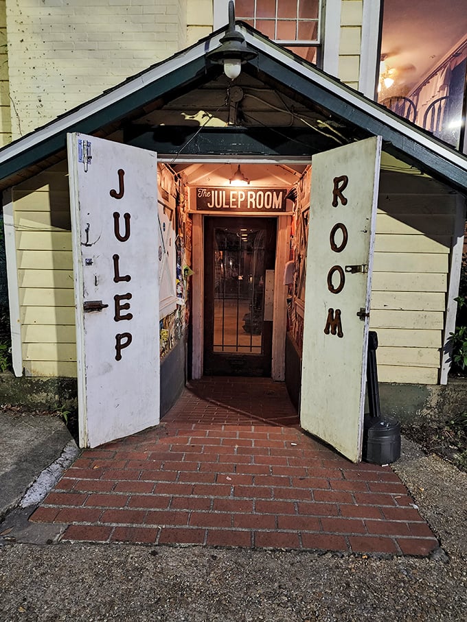 "The Julep Room" beckons from this charming entrance &ndash; a portal to cocktails and conversation after your catfish feast.