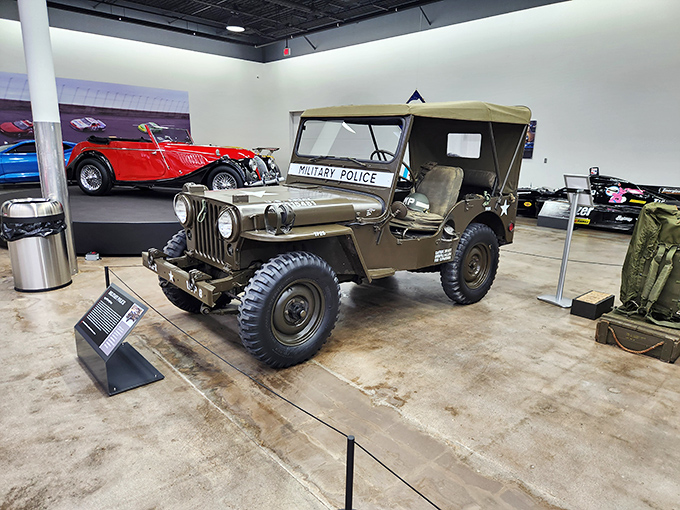 This military Jeep stands at attention, a rugged reminder of automotive history's practical side &ndash; before cup holders became a selling point. 