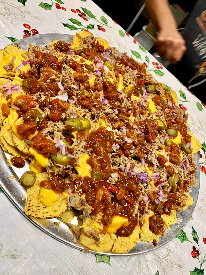 Nachos that don't know when to quit&mdash;loaded with pulled pork, cheese sauce, and enough toppings to make sharing mandatory but regrettable.