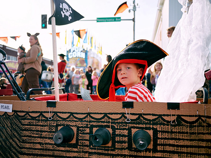 This young sailor-pirate hybrid isn't lost at sea&mdash;he's part of a parade where community creativity transforms ordinary cardboard into extraordinary childhood memories.