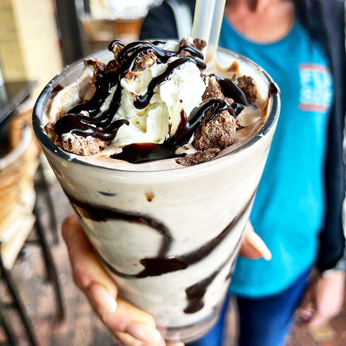 This milkshake brings all the grown-ups to the yard. Nutella and chocolate living their best lives in a glass tall enough to hide your shame.