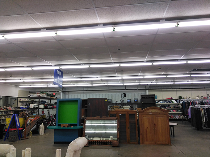 The vastness of the space hints at treasures yet undiscovered. That wooden cabinet might just be the missing piece in your home puzzle.