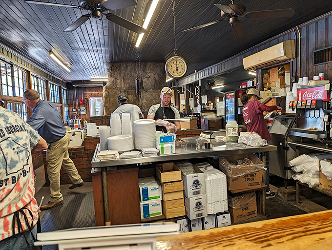 Behind the scenes where the magic happens&mdash;no fancy equipment, just decades of know-how and hands that understand barbecue on a molecular level.