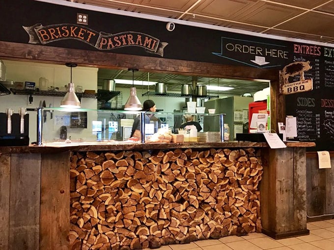The ordering counter reveals the secret to great barbecue: stacked wood, dedication, and a clear system for getting flavor into customers' hands as efficiently as possible.
