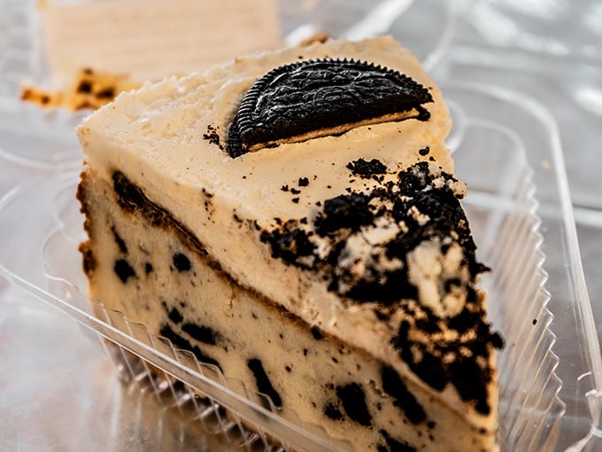 This slice of Oreo cheesecake is having an identity crisis in the best possible way. Cookie? Cheesecake? Both? Yes, please.