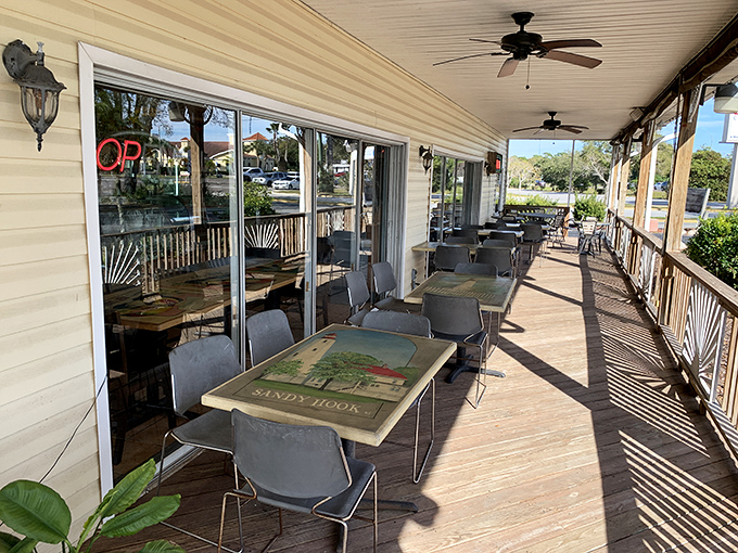 The breezy porch seating offers the perfect spot to contemplate life's big questions, like "Should I order a second slice?" (Spoiler: Yes, always yes.)