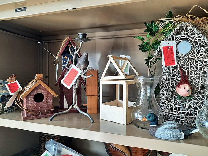 Birdhouses and garden whimsy that once adorned someone's backyard now await adoption into your outdoor sanctuary&mdash;quirky personality included.