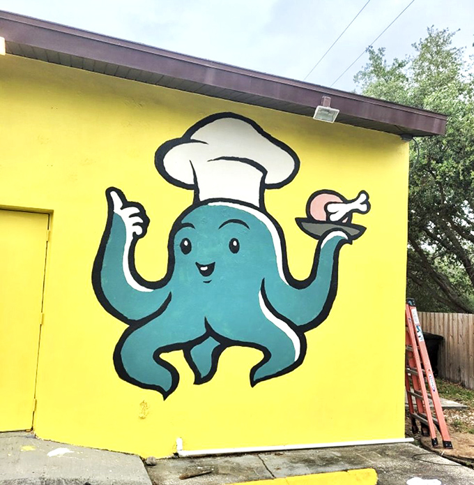 Not all heroes wear capes&mdash;some are blue octopuses on bright yellow walls. This mural perfectly captures the whimsical spirit of a serious food destination.