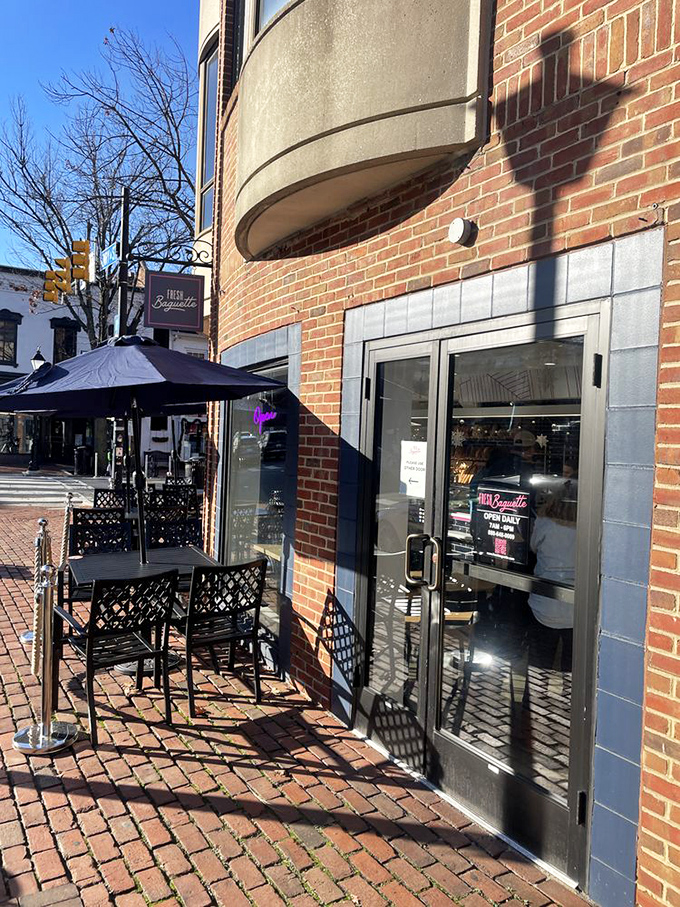 Sidewalk seating that captures Alexandria's brick-lined charm &ndash; where your breakfast sandwich comes with a side of historic ambiance.