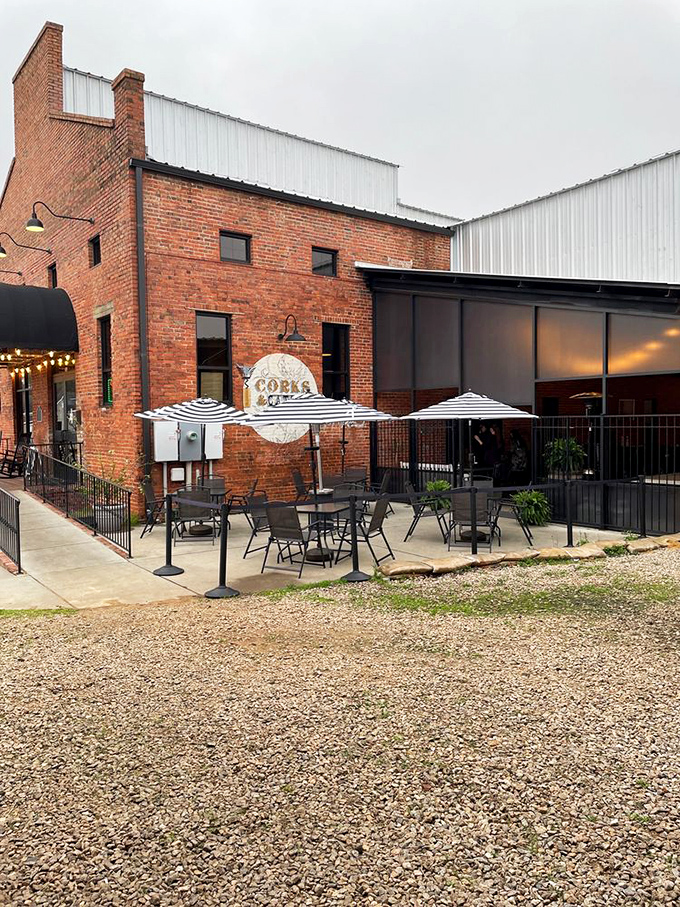 Al fresco dining Alabama-style: Simple tables, striped umbrellas, and the pleasant knowledge that good food awaits beneath that brick fa&ccedil;ade.