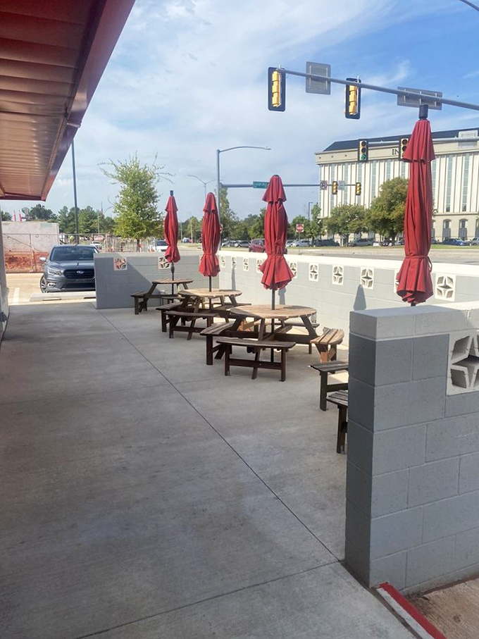 Al fresco dining with a side of people-watching&mdash;these outdoor tables with cheerful red umbrellas turn breakfast into an event.