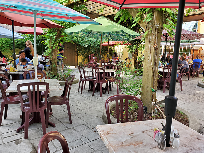 Outdoor seating that feels like dining in a secret garden&mdash;umbrellas providing shade while you contemplate ordering seconds. Or thirds.