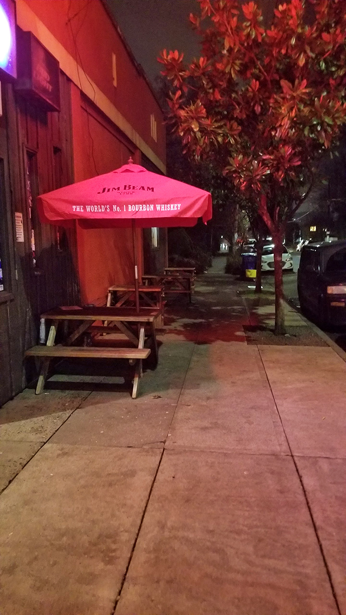 Outside, simple picnic tables and branded umbrellas offer a moment of fresh air between bites of life-changing chicken and conversation with newfound friends.