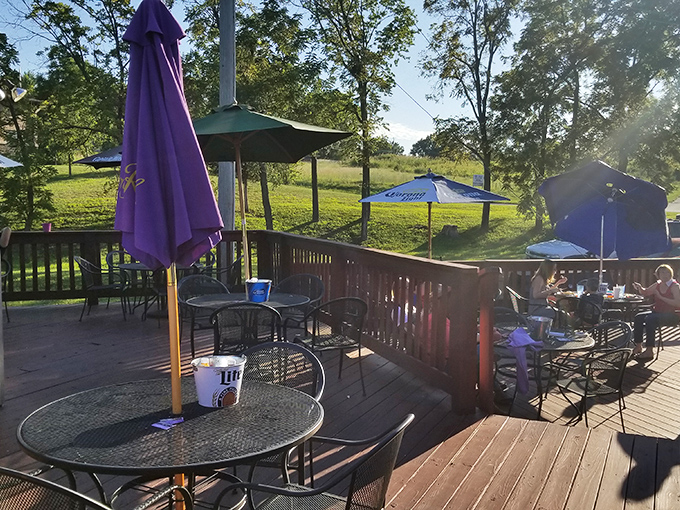 The outdoor deck offers fresh air with your fresh cuts. Kansas sunlight filtering through umbrellas makes everything taste better.