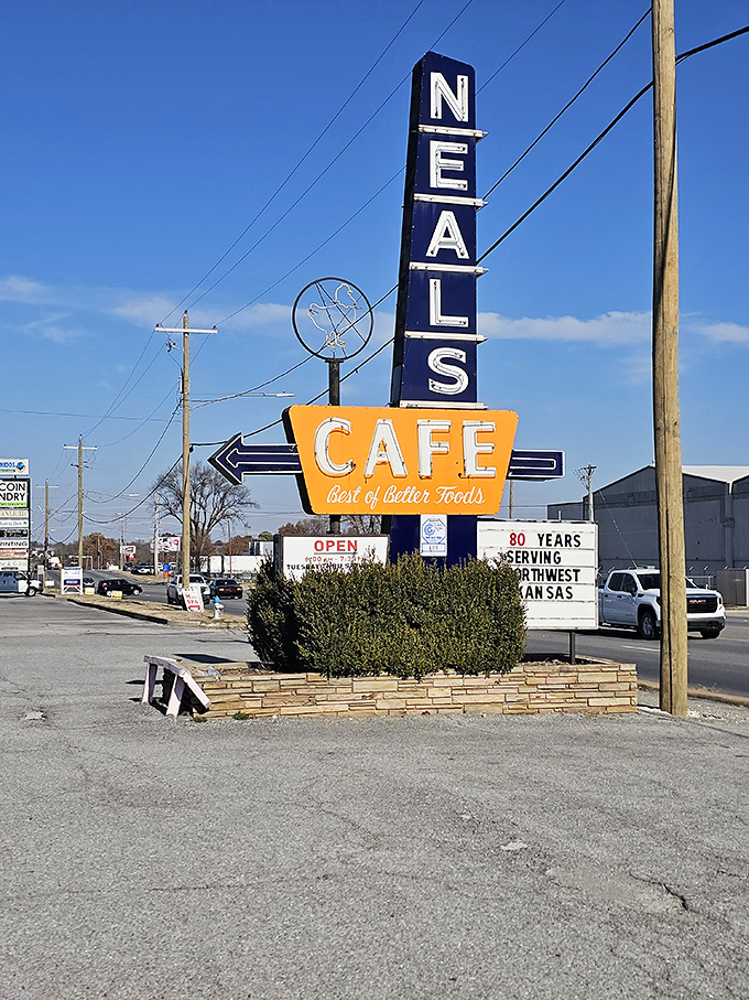 The vintage sign stands like a sentinel of satisfaction, promising "Best of Better Foods" to those wise enough to pull over.