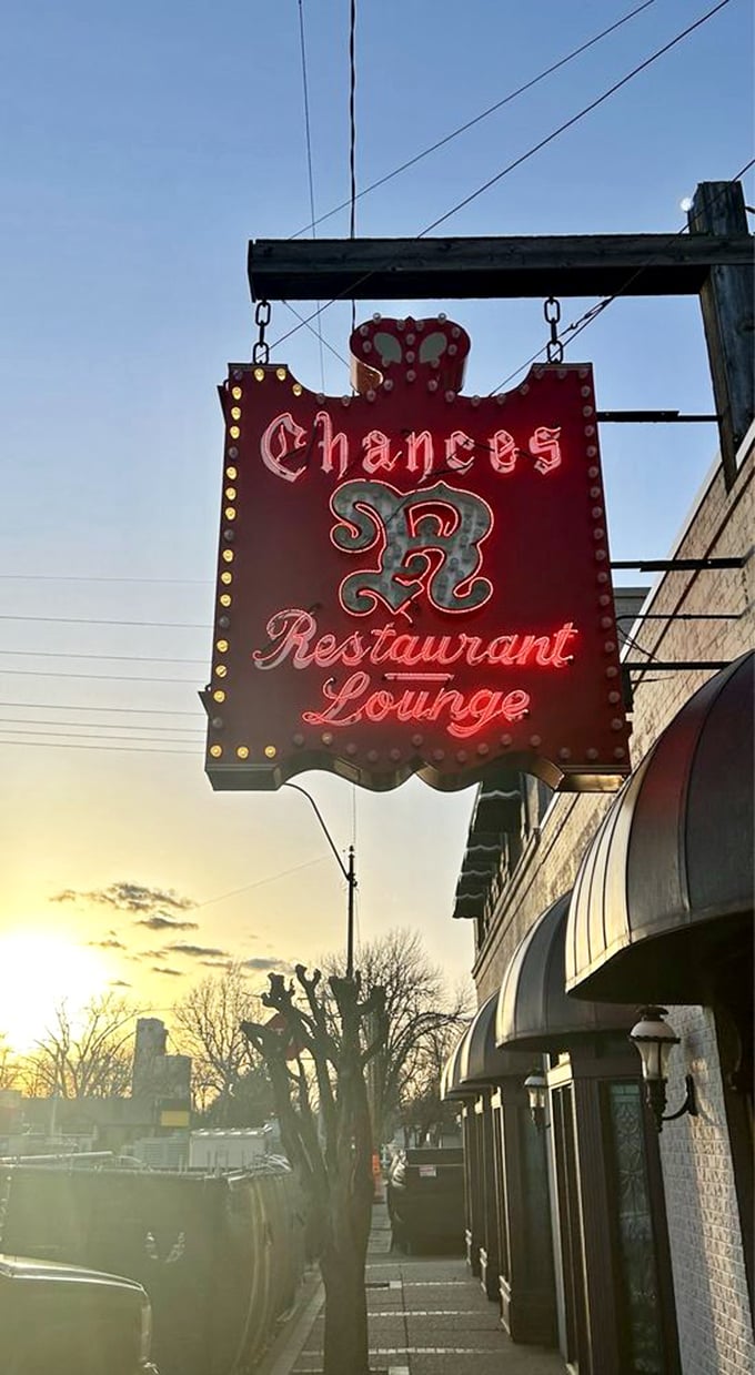 The vintage neon sign glows like a beacon at sunset, calling hungry travelers home. In Nebraska, "Chances R" you're about to have a memorable meal.