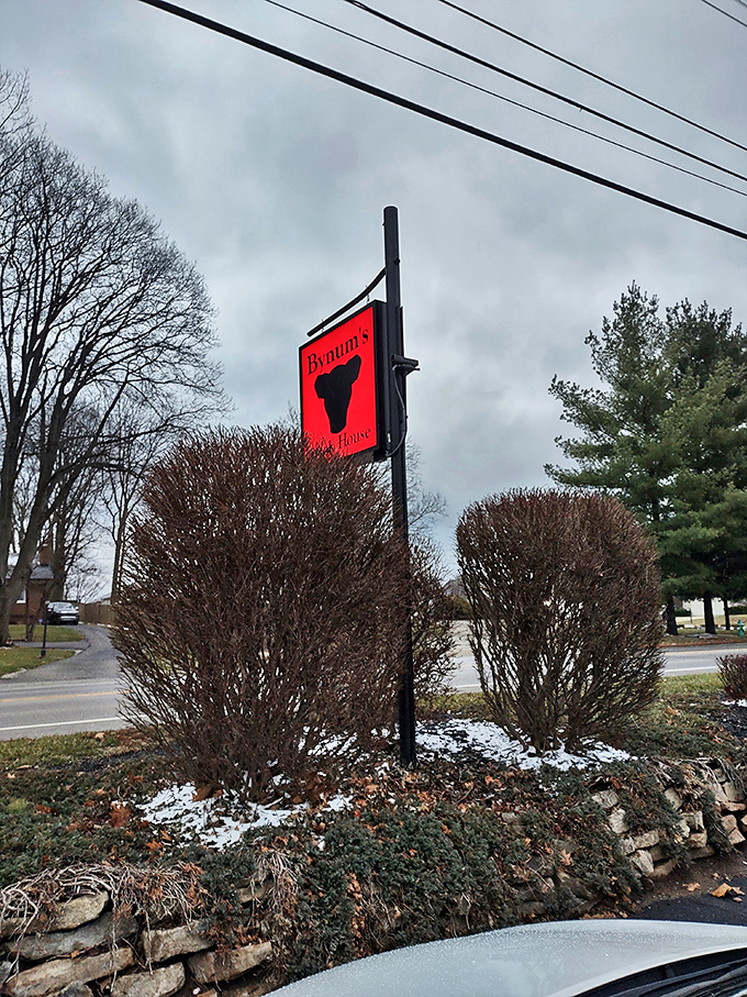 The bold red sign stands like a beacon for hungry travelers&mdash;a North Star for those guided by their appetites.