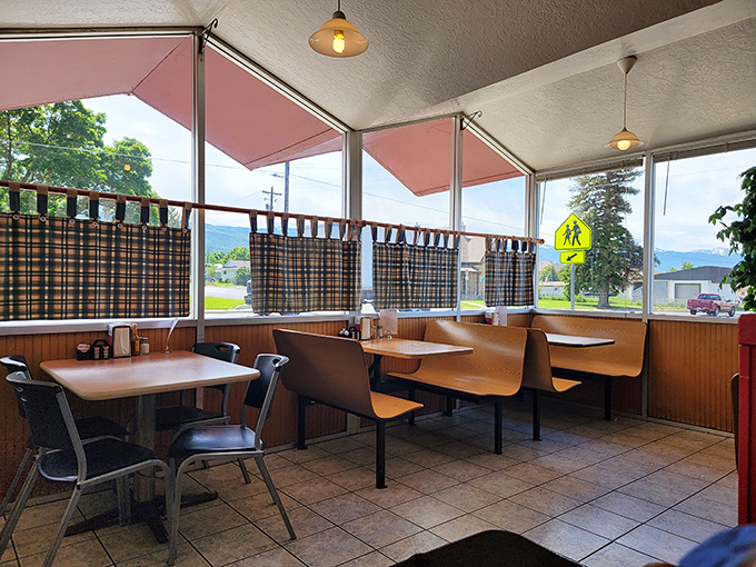 Window booths offering mountain views with your meal—nature's version of dinner theater, only it happens at breakfast.