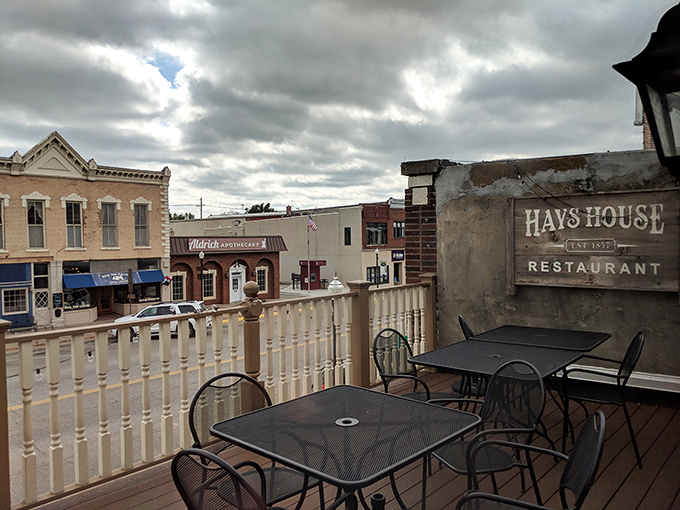 The balcony view offers a glimpse of Council Grove's historic downtown, where Santa Fe Trail travelers once paused for provisions and gossip.