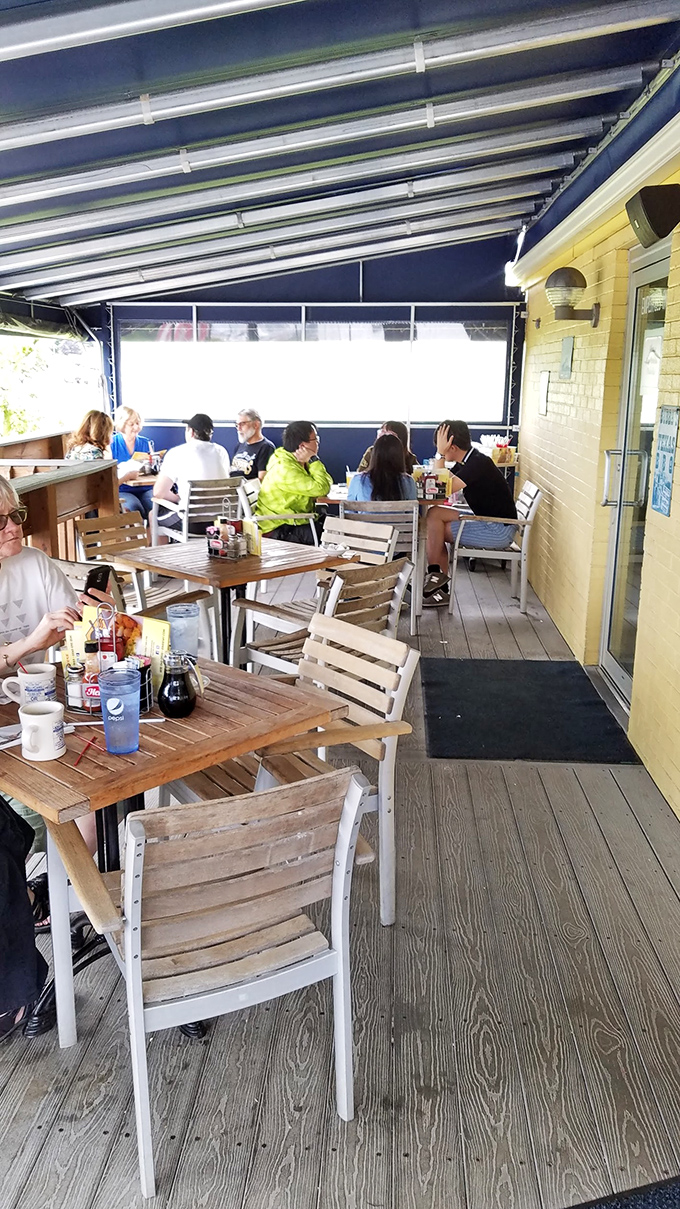 Outdoor seating where pancakes taste even better with a side of fresh air and people-watching.