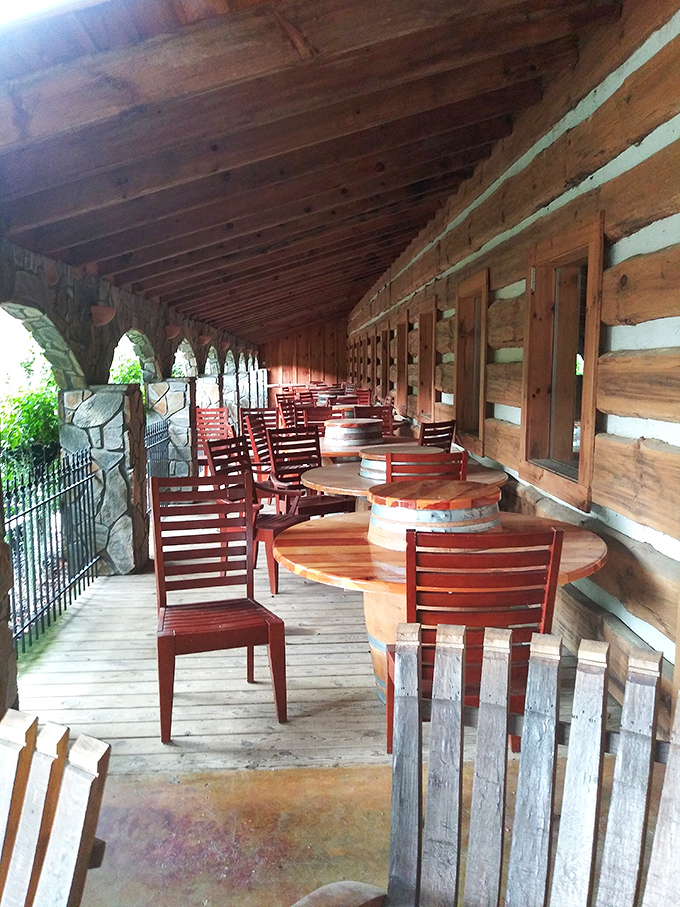 Wine barrel tables on the porch create the perfect setting for those "I'm technically outdoors but still want my comfort" dining moments.