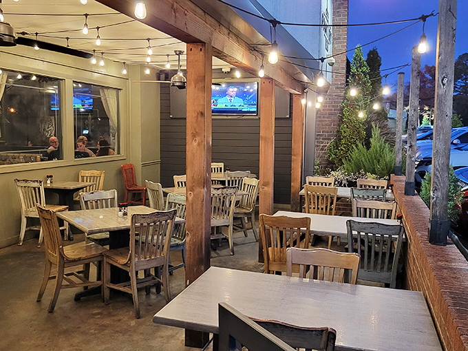 The patio: where string lights transform ordinary evenings into memory-making nights. Arkansas weather permitting, this is prime real estate for people-watching.